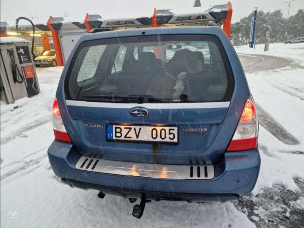 Blue Subaru Forester 2006 in Vilnius, with an engine capacity of 2.00 L and mileage of 385 thousand km for 2500 €, photo 6 on AUTOMOTO.COM.LV