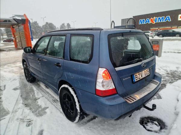 Blue Subaru Forester 2006 in Vilnius, with an engine capacity of 2.00 L and mileage of 385 thousand km for 2500 €, photo 7 on AUTOMOTO.COM.LV