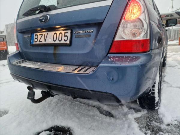Blue Subaru Forester 2006 in Vilnius, with an engine capacity of 2.00 L and mileage of 385 thousand km for 2500 €, photo 9 on AUTOMOTO.COM.LV
