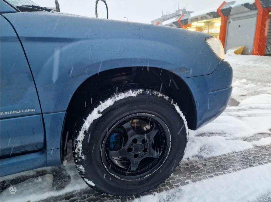 Blue Subaru Forester 2006 in Vilnius, with an engine capacity of 2.00 L and mileage of 385 thousand km for 2500 €, photo 11 on AUTOMOTO.COM.LV