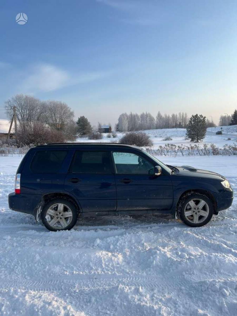 Blue Subaru Forester 2006 in Vilnius, with an engine capacity of 2.50 L and mileage of 264 thousand km for 3200 €, photo 5 on AUTOMOTO.COM.LV