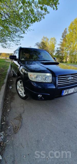 Blue Subaru Forester 2006 in Riga, with an engine capacity of 2.50 L and mileage of 310 thousand km for 4500 €, photo  on AUTOMOTO.COM.LV