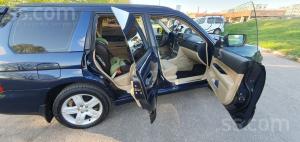 Blue Subaru Forester 2006 in Riga, with an engine capacity of 2.50 L and mileage of 310 thousand km for 4500 €, photo 4 on AUTOMOTO.COM.LV