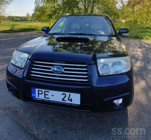 Blue Subaru Forester 2006 in Riga, with an engine capacity of 2.50 L and mileage of 310 thousand km for 4500 €, photo 8 on AUTOMOTO.COM.LV