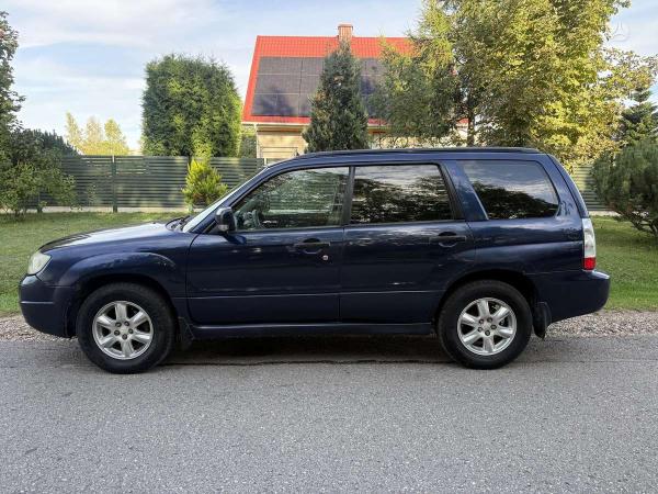 Subaru Forester 2006 in Vilnius on AUTOMOTO.COM.LV Blue Subaru Forester 2006 in Vilnius, with an engine capacity of 1.99 L and mileage of 433 thousand km for 2250 €, photo 4 on AUTOMOTO.COM.LV