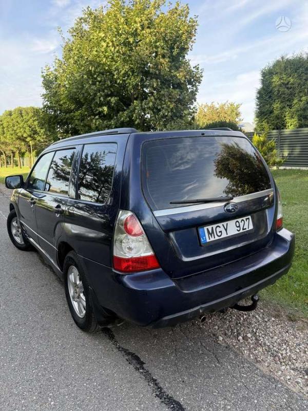 Subaru Forester 2006 in Vilnius on AUTOMOTO.COM.LV Blue Subaru Forester 2006 in Vilnius, with an engine capacity of 1.99 L and mileage of 433 thousand km for 2250 €, photo 6 on AUTOMOTO.COM.LV