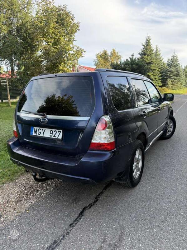 Subaru Forester 2006 in Vilnius on AUTOMOTO.COM.LV Blue Subaru Forester 2006 in Vilnius, with an engine capacity of 1.99 L and mileage of 433 thousand km for 2250 €, photo 7 on AUTOMOTO.COM.LV