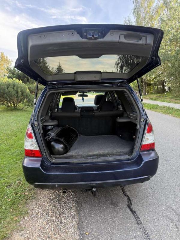 Subaru Forester 2006 in Vilnius on AUTOMOTO.COM.LV Blue Subaru Forester 2006 in Vilnius, with an engine capacity of 1.99 L and mileage of 433 thousand km for 2250 €, photo 10 on AUTOMOTO.COM.LV