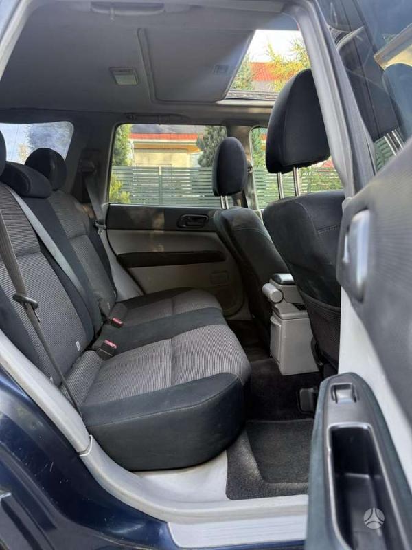 Subaru Forester 2006 in Vilnius on AUTOMOTO.COM.LV Blue Subaru Forester 2006 in Vilnius, with an engine capacity of 1.99 L and mileage of 433 thousand km for 2250 €, photo 11 on AUTOMOTO.COM.LV