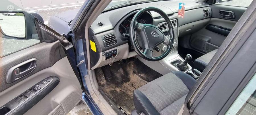 Blue Subaru Forester 2007 in Vilnius, with an engine capacity of 1.99 L and mileage of 403 thousand km for 1250 €, photo 8 on AUTOMOTO.COM.LV