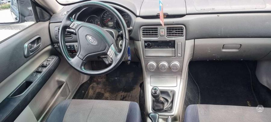 Blue Subaru Forester 2007 in Vilnius, with an engine capacity of 1.99 L and mileage of 403 thousand km for 1250 €, photo 12 on AUTOMOTO.COM.LV