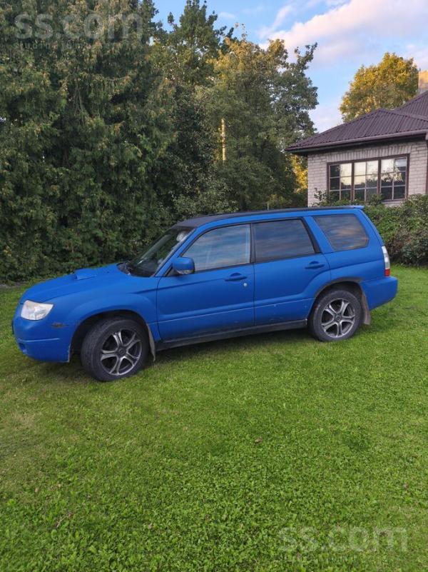 Blue Subaru Forester 2007 in Riga, with an engine capacity of 2.00 L and mileage of 411 thousand km for 2750 €, photo 3 on AUTOMOTO.COM.LV