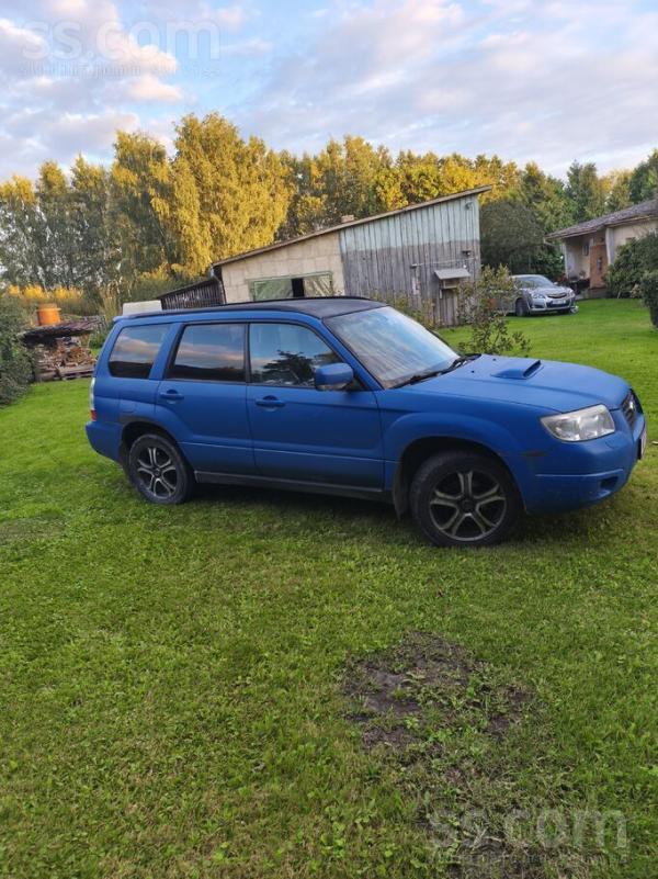 Blue Subaru Forester 2007 in Riga, with an engine capacity of 2.00 L and mileage of 411 thousand km for 2750 €, photo 4 on AUTOMOTO.COM.LV