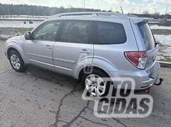 Blue Subaru Forester 2010 in Vilnius, with an engine capacity of 2.50 L and mileage of 257 thousand km for 3450 €, photo 6 on AUTOMOTO.COM.LV