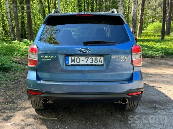 Blue Subaru Forester 2014 in Riga, with an engine capacity of 2.00 L and mileage of 0 thousand km for 10599 €, photo 4 on AUTOMOTO.COM.LV