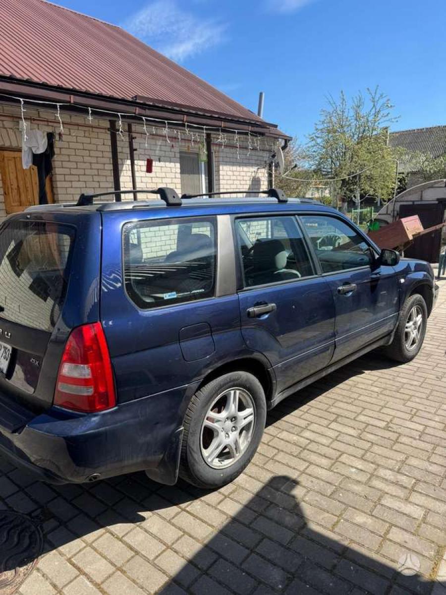 Blue Subaru Forester 2005 in Vilnius, with an engine capacity of 2.46 L and mileage of 268 thousand km for 1900 €, photo 12 on AUTOMOTO.COM.LV
