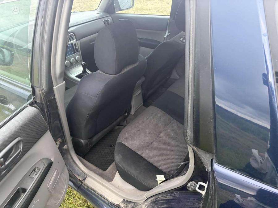 Blue Subaru Forester 2006 in Klaipeda, with an engine capacity of 1.99 L and mileage of 293 thousand km for 3600 €, photo 7 on AUTOMOTO.COM.LV