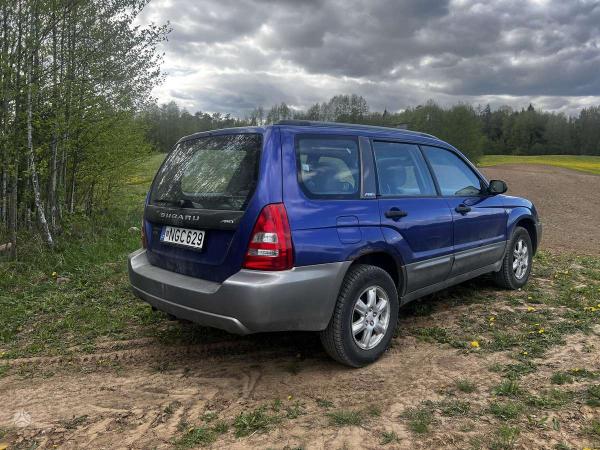 Субару Форестер 2002 в Алитус на AUTOMOTO.COM.LV Синий Субару Форестер 2002 в Алитус, объемом двигателя 2.00 л и пробегом 85 тыс. км за 1900 €, фото 4 на AUTOMOTO.COM.LV