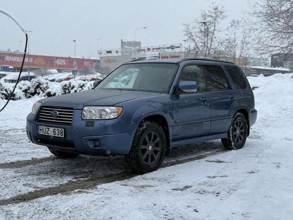 Blue Subaru Forester 2008 in Vilnius, with an engine capacity of 2.50 L and mileage of 256 thousand km for 2350 €, photo 3 on AUTOMOTO.COM.LV
