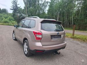 Brown Subaru Forester 2014 in Utena, with an engine capacity of 2.00 L and mileage of 263 thousand km for 6400 €, photo 7 on AUTOMOTO.COM.LV