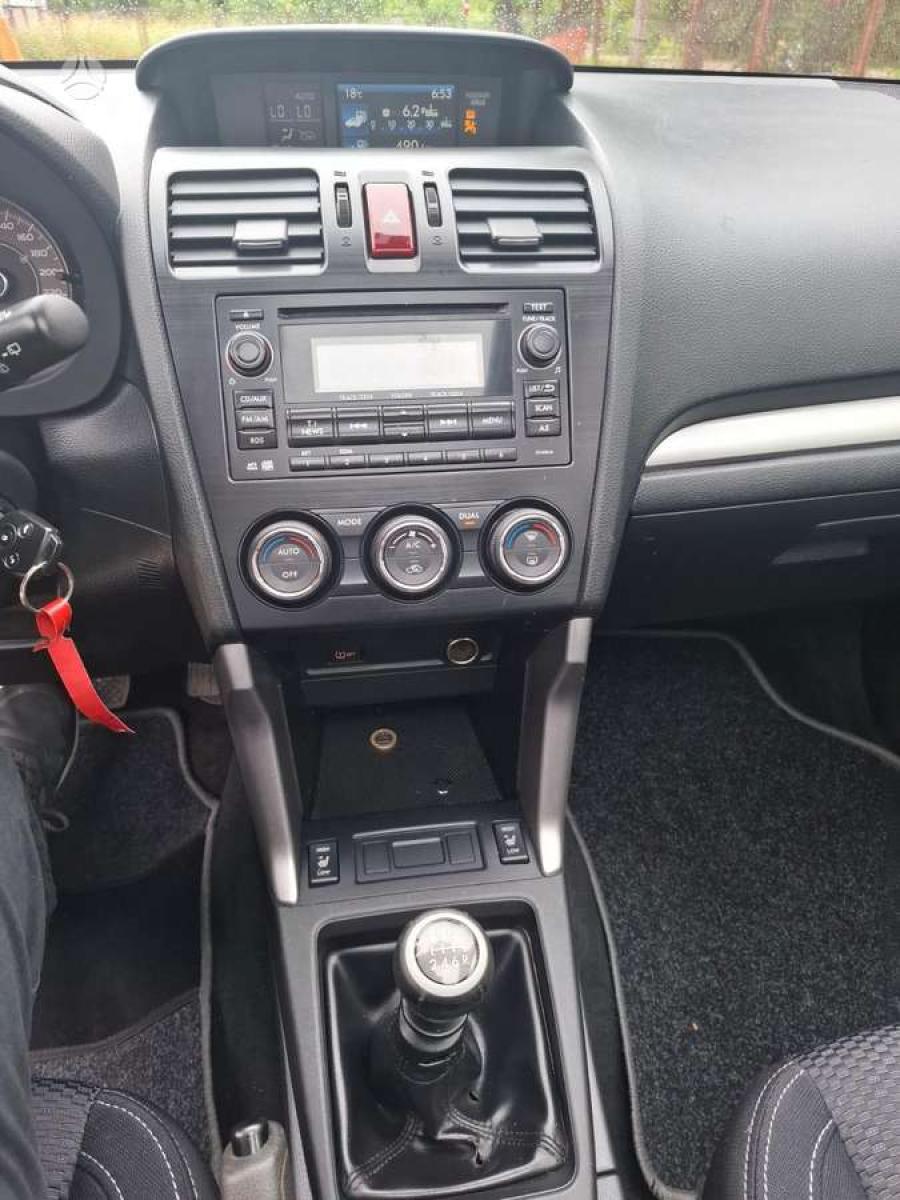 Brown Subaru Forester 2014 in Utena, with an engine capacity of 2.00 L and mileage of 263 thousand km for 6400 €, photo 15 on AUTOMOTO.COM.LV