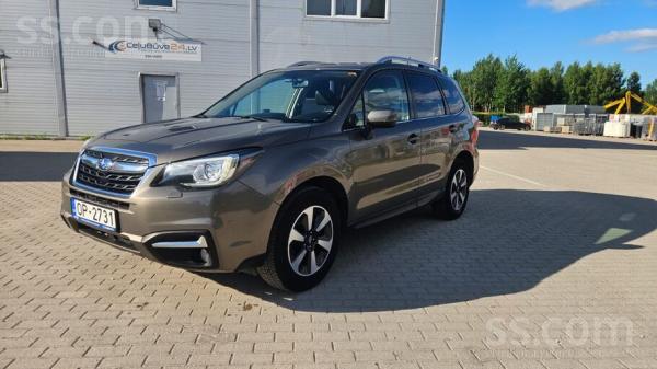 Brown Subaru Forester 2016 in Riga, with an engine capacity of 2.00 L and mileage of 143 thousand km for 12600 €, photo 3 on AUTOMOTO.COM.LV
