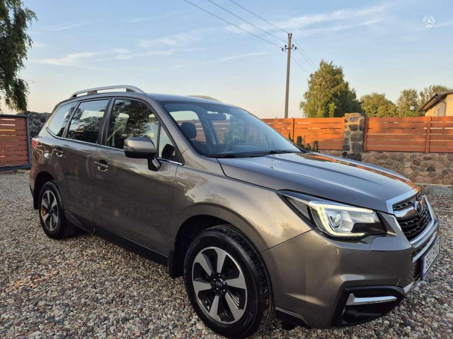 Brown Subaru Forester 2018 in Marijampole, with an engine capacity of 2.00 L and mileage of 215 thousand km for 10800 €, photo 3 on AUTOMOTO.COM.LV