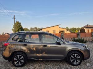 Brown Subaru Forester 2018 in Marijampole, with an engine capacity of 2.00 L and mileage of 215 thousand km for 10800 €, photo 15 on AUTOMOTO.COM.LV