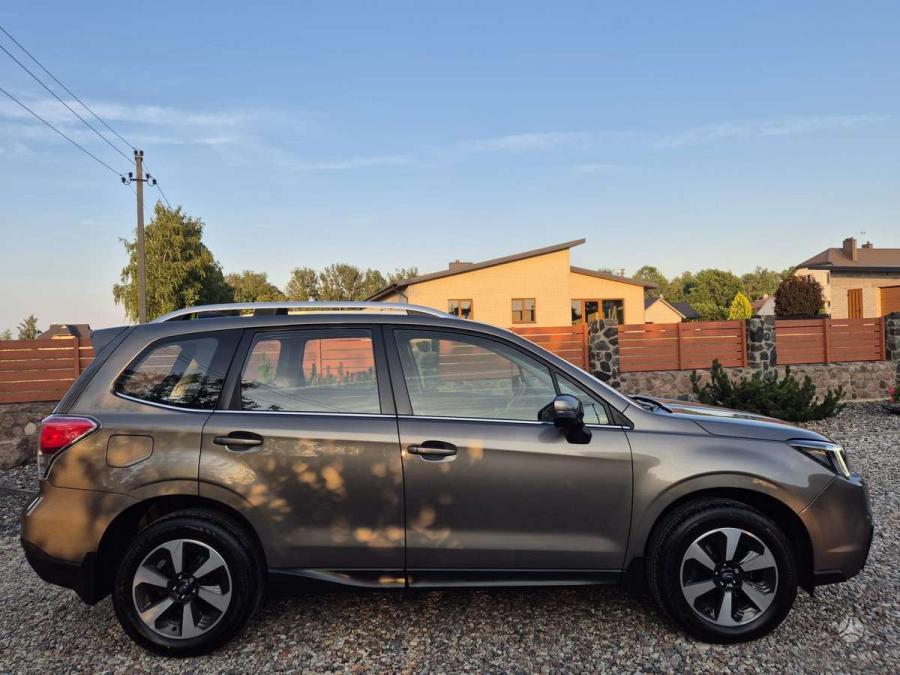 Brown Subaru Forester 2018 in Marijampole, with an engine capacity of 2.00 L and mileage of 215 thousand km for 10800 €, photo 15 on AUTOMOTO.COM.LV