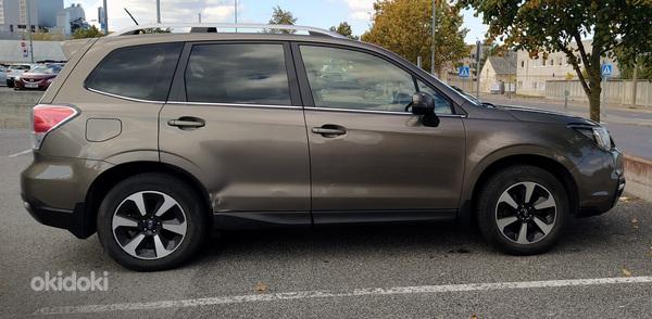 Brown Subaru Forester 2016 in Johvi, with an engine capacity of 0.11 L and mileage of 298 thousand km for 10500 €, photo 4 on AUTOMOTO.COM.LV