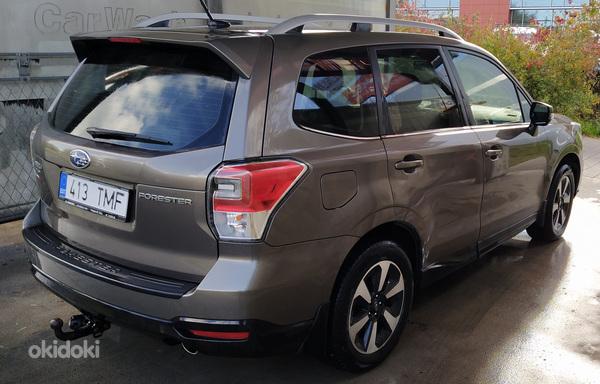 Brown Subaru Forester 2016 in Johvi, with an engine capacity of 0.11 L and mileage of 298 thousand km for 10500 €, photo 5 on AUTOMOTO.COM.LV
