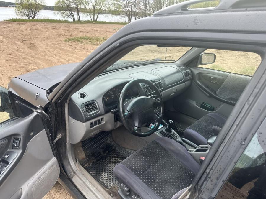 Subaru Forester 1998 in Plunge, with an engine capacity of 2.00 L and mileage of 380 thousand km for 1300 €, photo 9 on AUTOMOTO.COM.LV