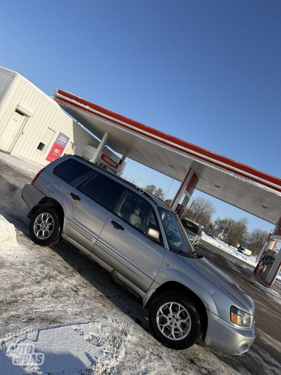 Subaru Forester 2005 in Panevezys, with an engine capacity of 2.50 L and mileage of 200 thousand km for 2350 €, photo 12 on AUTOMOTO.COM.LV