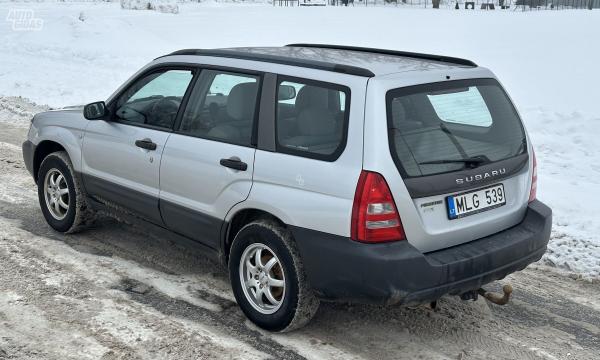 Subaru Forester 2005 in Siauliai, with an engine capacity of 2.00 L and mileage of 393 thousand km for 2250 €, photo 7 on AUTOMOTO.COM.LV