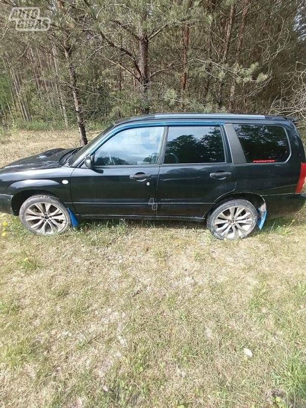 Subaru Forester 2005 Viļņa, ar dzinēja tilpumu 2.50 L un nobraukumu 300 tūkst. km par 1100 €, foto 3 vietnē AUTOMOTO.COM.LV