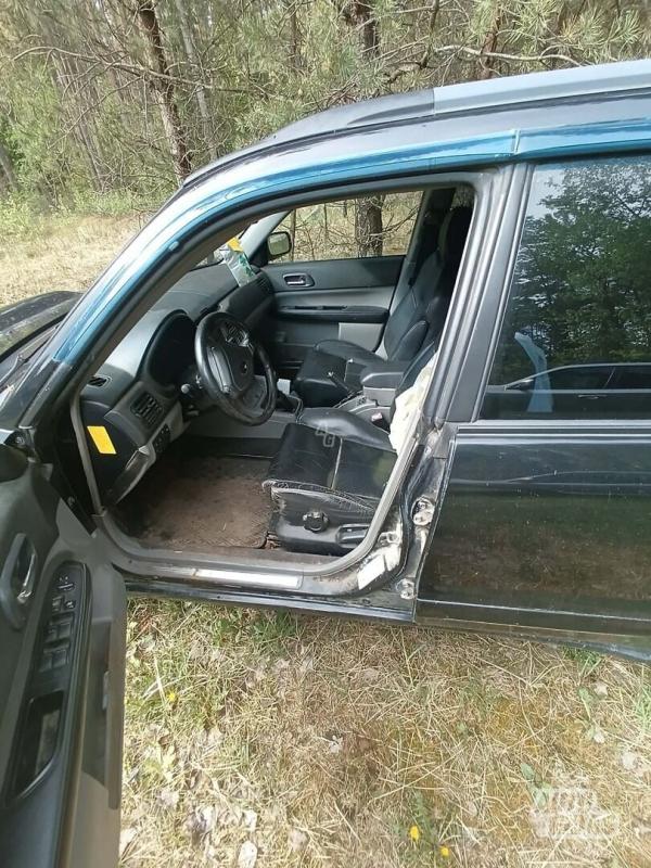 Subaru Forester 2005 Viļņa, ar dzinēja tilpumu 2.50 L un nobraukumu 300 tūkst. km par 1100 €, foto 4 vietnē AUTOMOTO.COM.LV