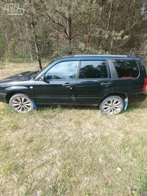 Subaru Forester 2005 Viļņa, ar dzinēja tilpumu 2.50 L un nobraukumu 300 tūkst. km par 1100 €, foto 4 vietnē AUTOMOTO.COM.LV
