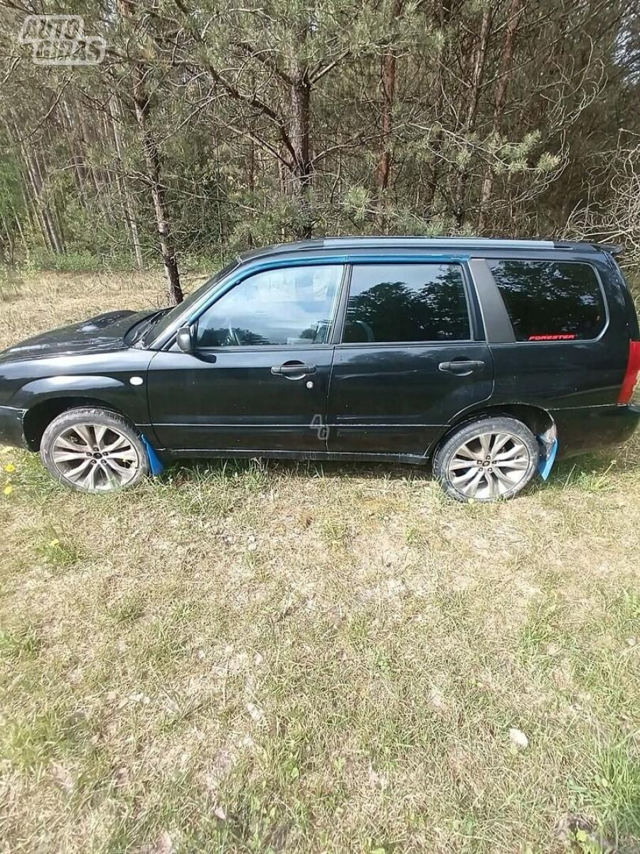 Subaru Forester 2005 Viļņa, ar dzinēja tilpumu 2.50 L un nobraukumu 300 tūkst. km par 1100 €, foto 4 vietnē AUTOMOTO.COM.LV