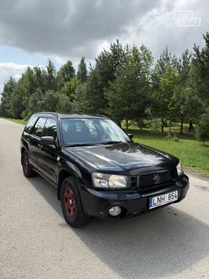 Subaru Forester 2005 in Panevezys, with an engine capacity of 2.00 L and mileage of 300 thousand km for 2350 €, photo 3 on AUTOMOTO.COM.LV