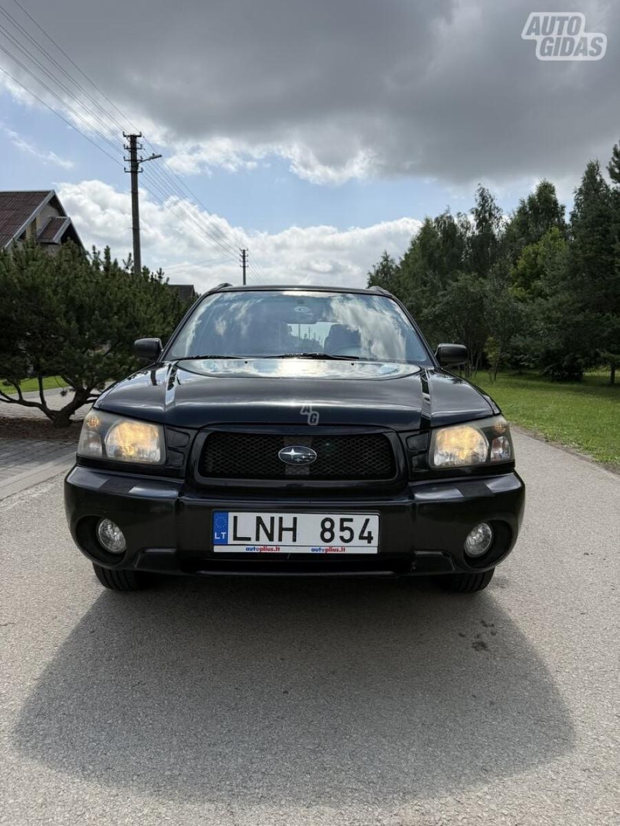 Subaru Forester 2005 in Panevezys, with an engine capacity of 2.00 L and mileage of 300 thousand km for 2350 €, photo 5 on AUTOMOTO.COM.LV
