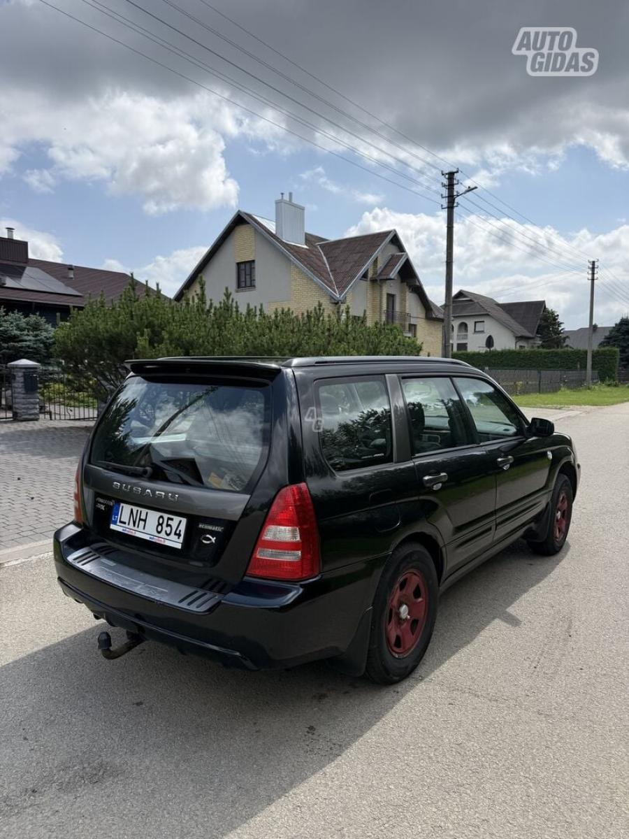 Subaru Forester 2005 in Panevezys, with an engine capacity of 2.00 L and mileage of 300 thousand km for 2350 €, photo 6 on AUTOMOTO.COM.LV