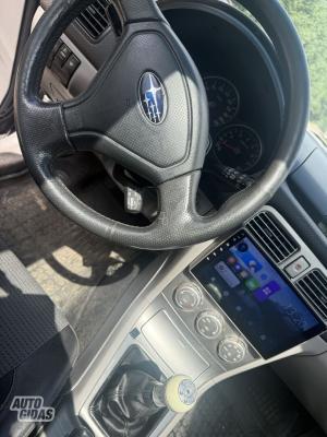 Subaru Forester 2005 in Panevezys, with an engine capacity of 2.00 L and mileage of 300 thousand km for 2350 €, photo 11 on AUTOMOTO.COM.LV