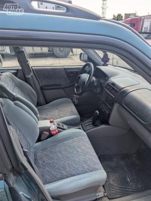 Green Subaru Forester 1994 in Kaunas, with an engine capacity of 2.00 L and mileage of 200 thousand km for 1750 €, photo 11 on AUTOMOTO.COM.LV