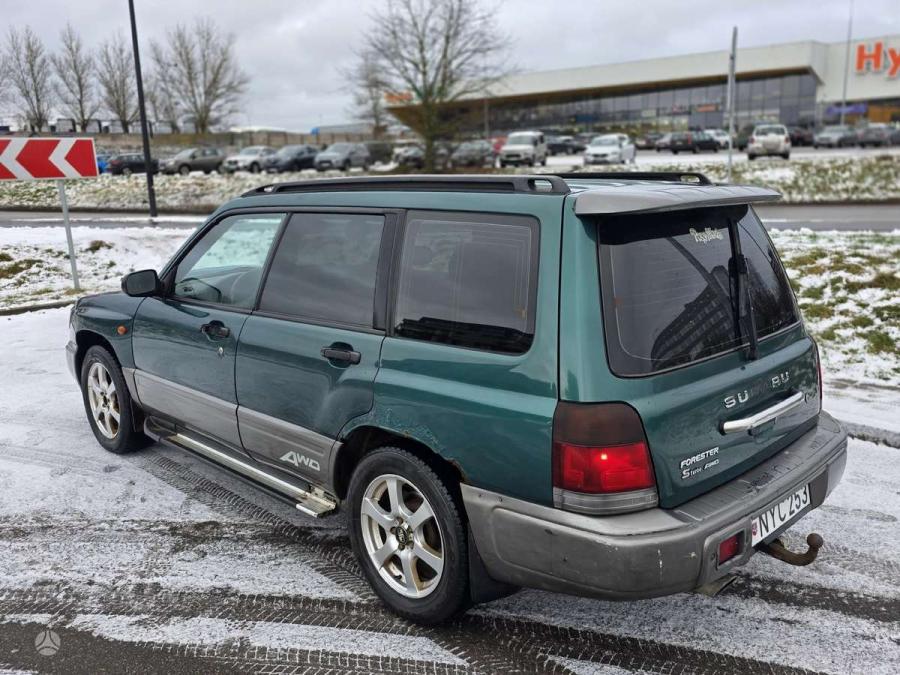 Green Subaru Forester 1999 in Vilnius, with an engine capacity of 1.99 L and mileage of 356 thousand km for 900 €, photo 6 on AUTOMOTO.COM.LV