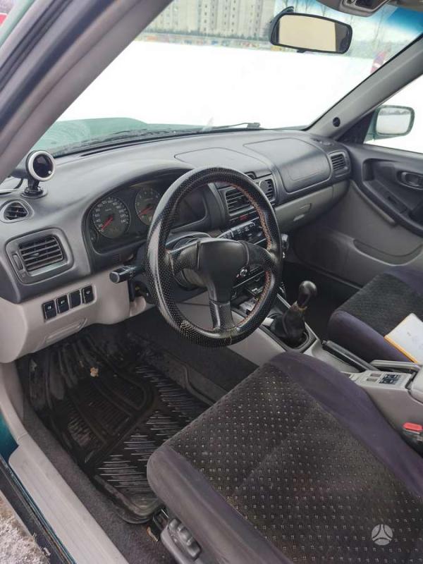 Green Subaru Forester 2001 in Kaunas, with an engine capacity of 1.99 L and mileage of 240 thousand km for 3600 €, photo 6 on AUTOMOTO.COM.LV