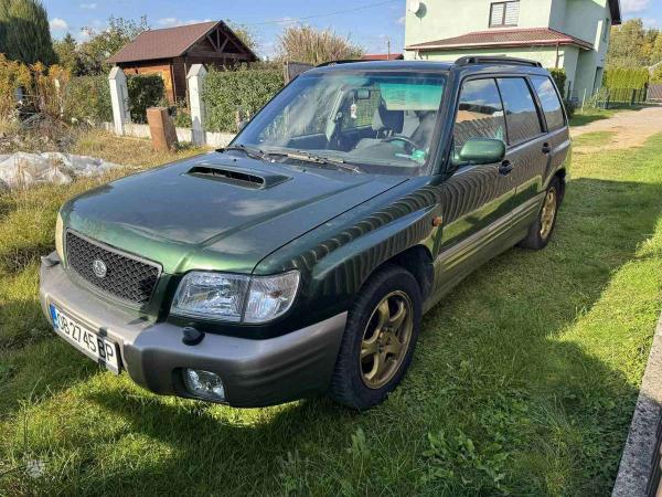 Green Subaru Forester 2002 in Kaunas, with an engine capacity of 1.99 L and mileage of 230 thousand km for 1499 €, photo 1 on AUTOMOTO.COM.LV