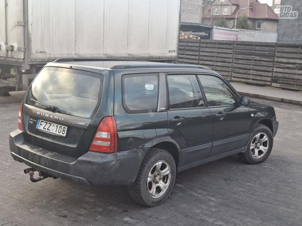 Green Subaru Forester 2004 in Silute, with an engine capacity of 2.00 L and mileage of 350 thousand km for 2350 €, photo 6 on AUTOMOTO.COM.LV