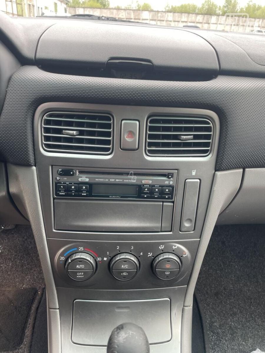 Green Subaru Forester 2004 in Siauliai, with an engine capacity of 2.00 L and mileage of 290 thousand km for 3800 €, photo 8 on AUTOMOTO.COM.LV