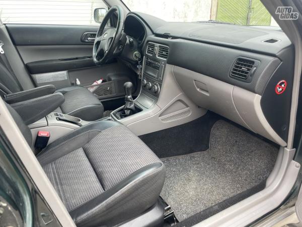Zaļš Subaru Forester 2004 Šauļi, ar dzinēja tilpumu 2.00 L un nobraukumu 290 tūkst. km par 3800 €, foto 9 vietnē AUTOMOTO.COM.LV
