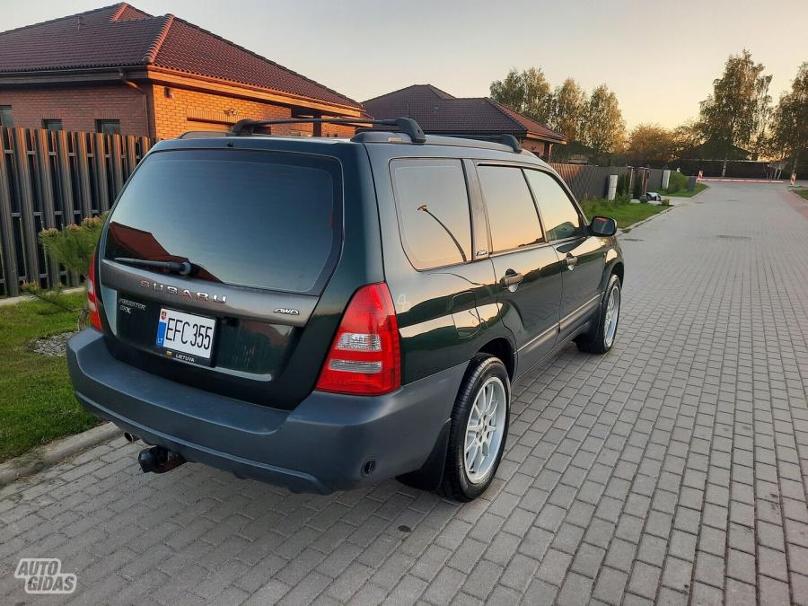 Green Subaru Forester 2004 in Klaipeda, with an engine capacity of 2.50 L and mileage of 144 thousand km for 3990 €, photo 7 on AUTOMOTO.COM.LV